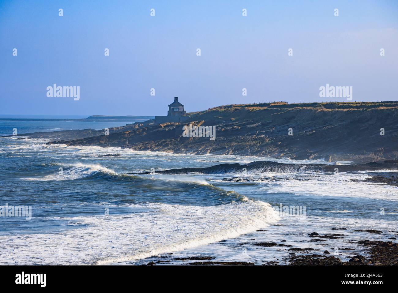 Looking south towards the Howick Bathing House with rough seas ...