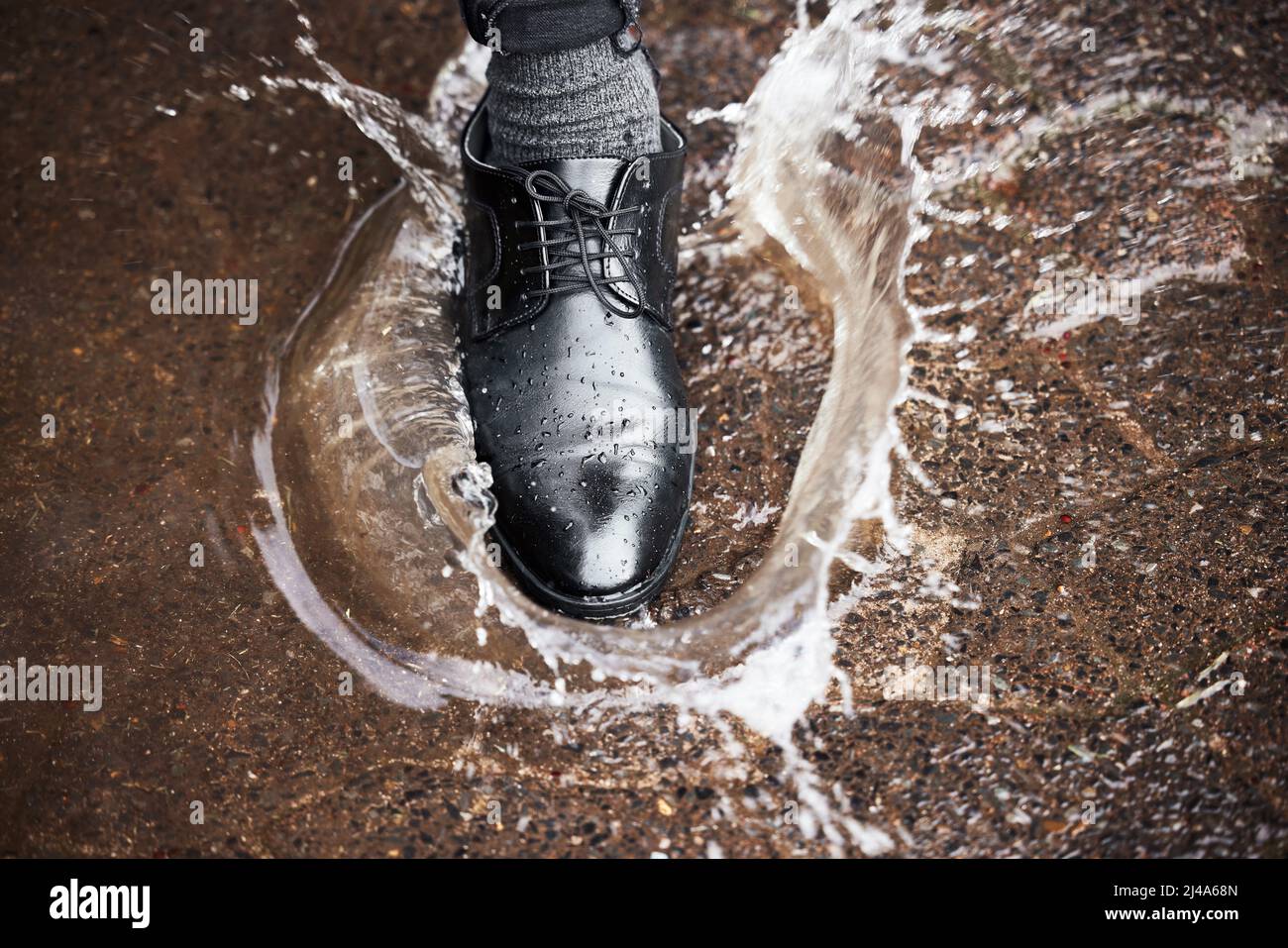 Splash puddle adult hi-res stock photography and images - Alamy