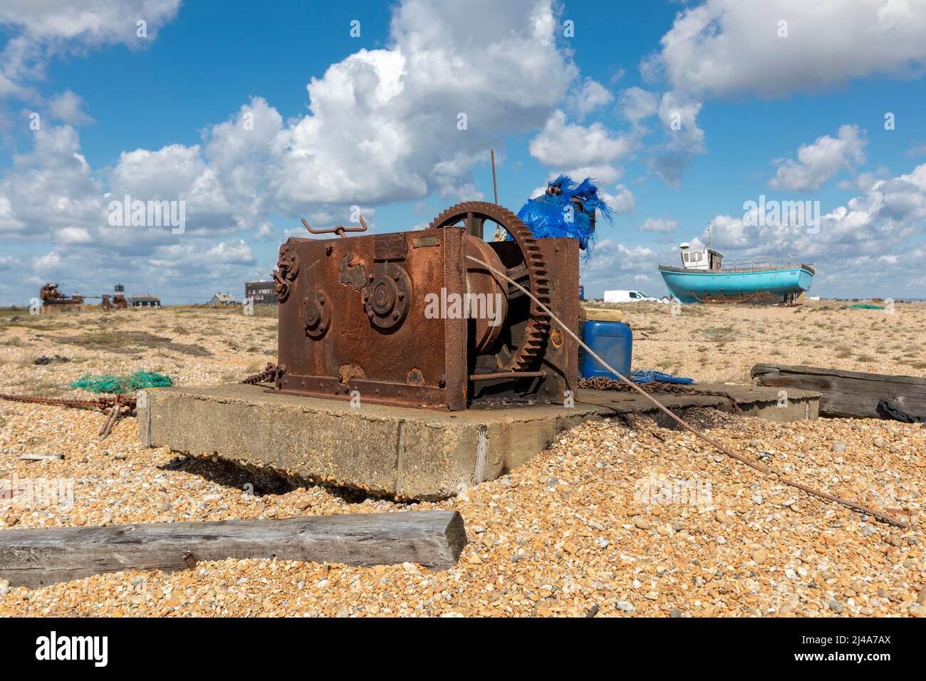 An old rusty winch on a shingle fishermans beach Stock Photo - Alamy