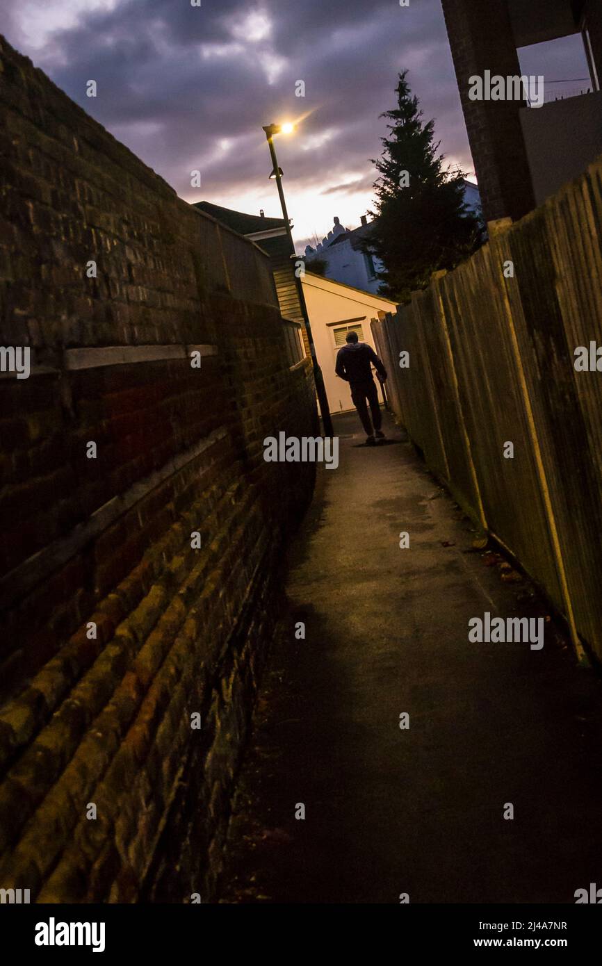 Man in Narrow alley, London, England Stock Photo - Alamy