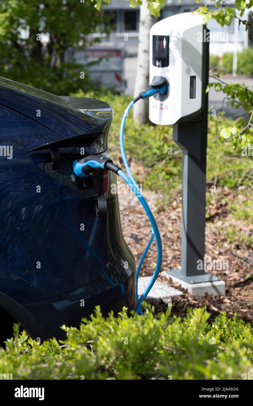 Cologne, Deutschland. 12th Apr, 2022. Parking lot with charging station ...