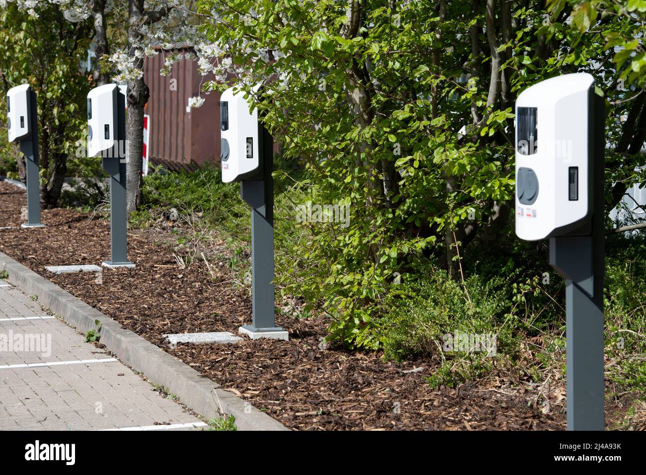 Cologne, Deutschland. 12th Apr, 2022. Parking lot with charging station ...