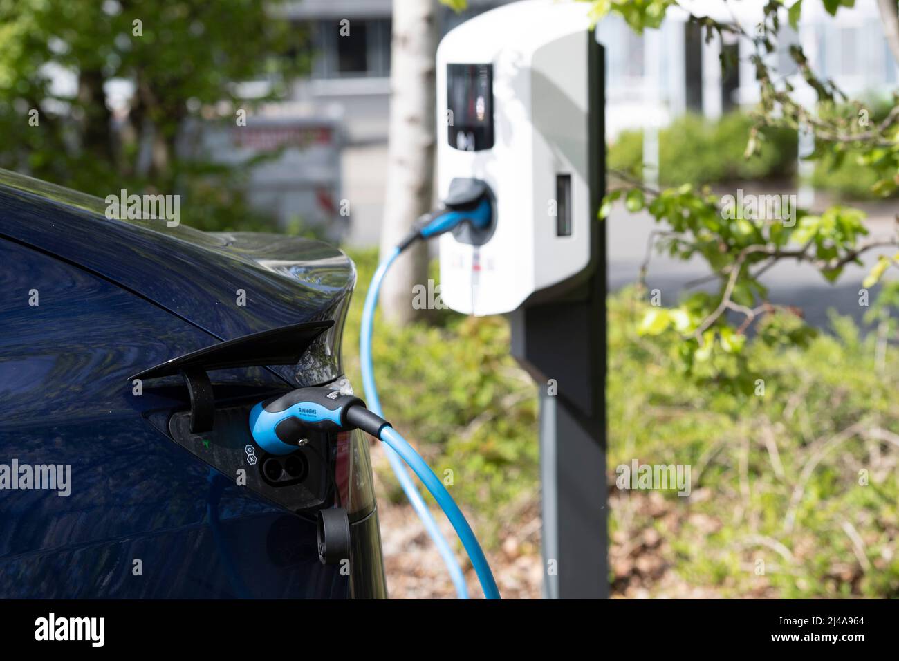 Cologne, Deutschland. 12th Apr, 2022. Parking lot with charging station ...
