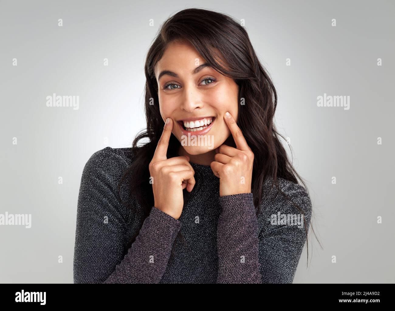 Remember to wear that beautiful smile. Cropped shot of a beautiful ...