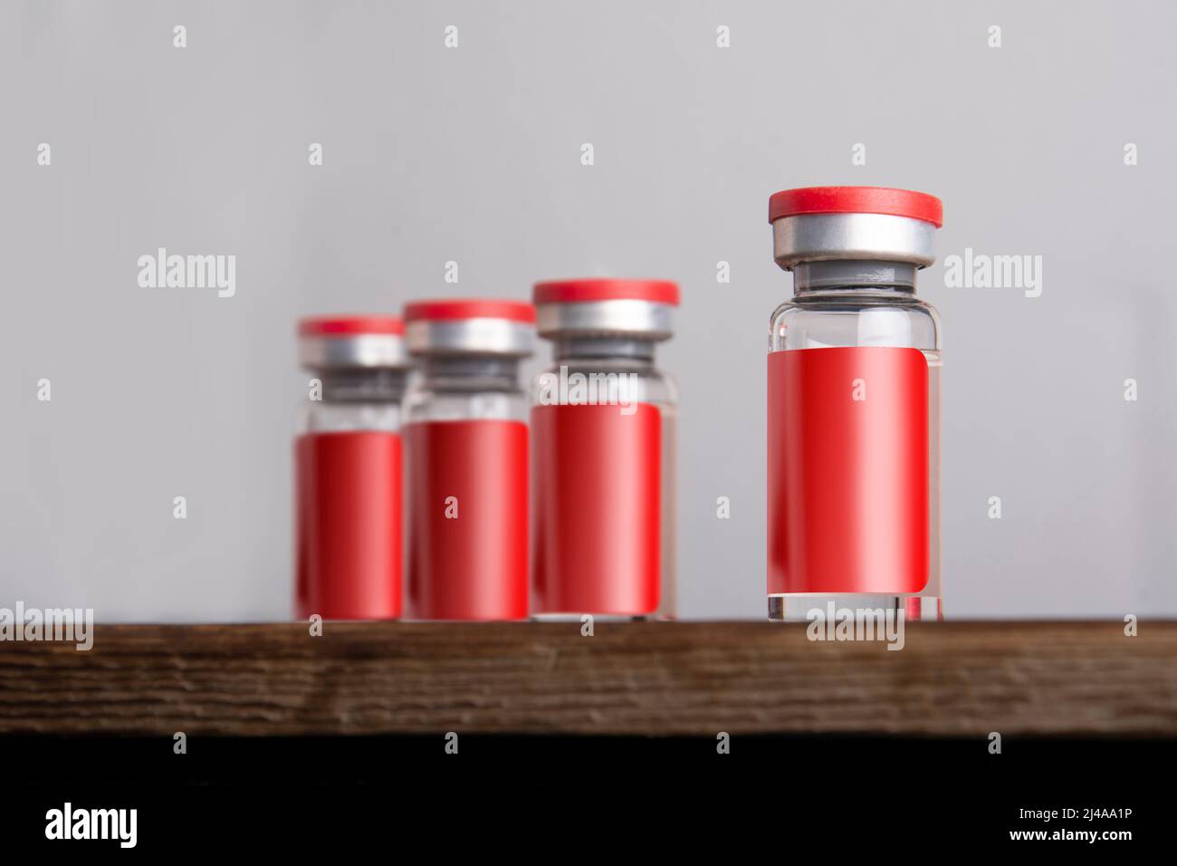 Medical vial for injection isolated on gray background. Medicine and ...