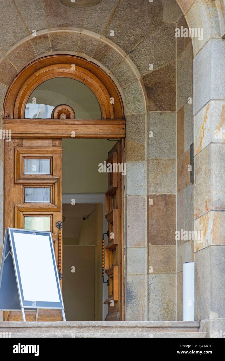 Open Arch Door Venue Entrance and Sign Board Copy Space Stock Photo - Alamy