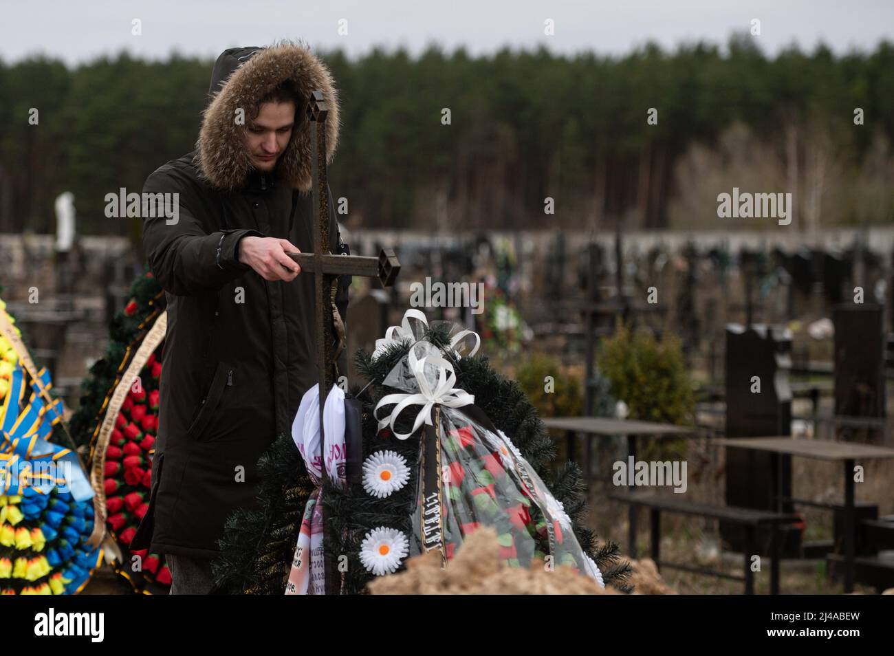Bucha, Kyiv Oblast, Ukraine. 13th April, 2022. Roman Verbovyi attends ...