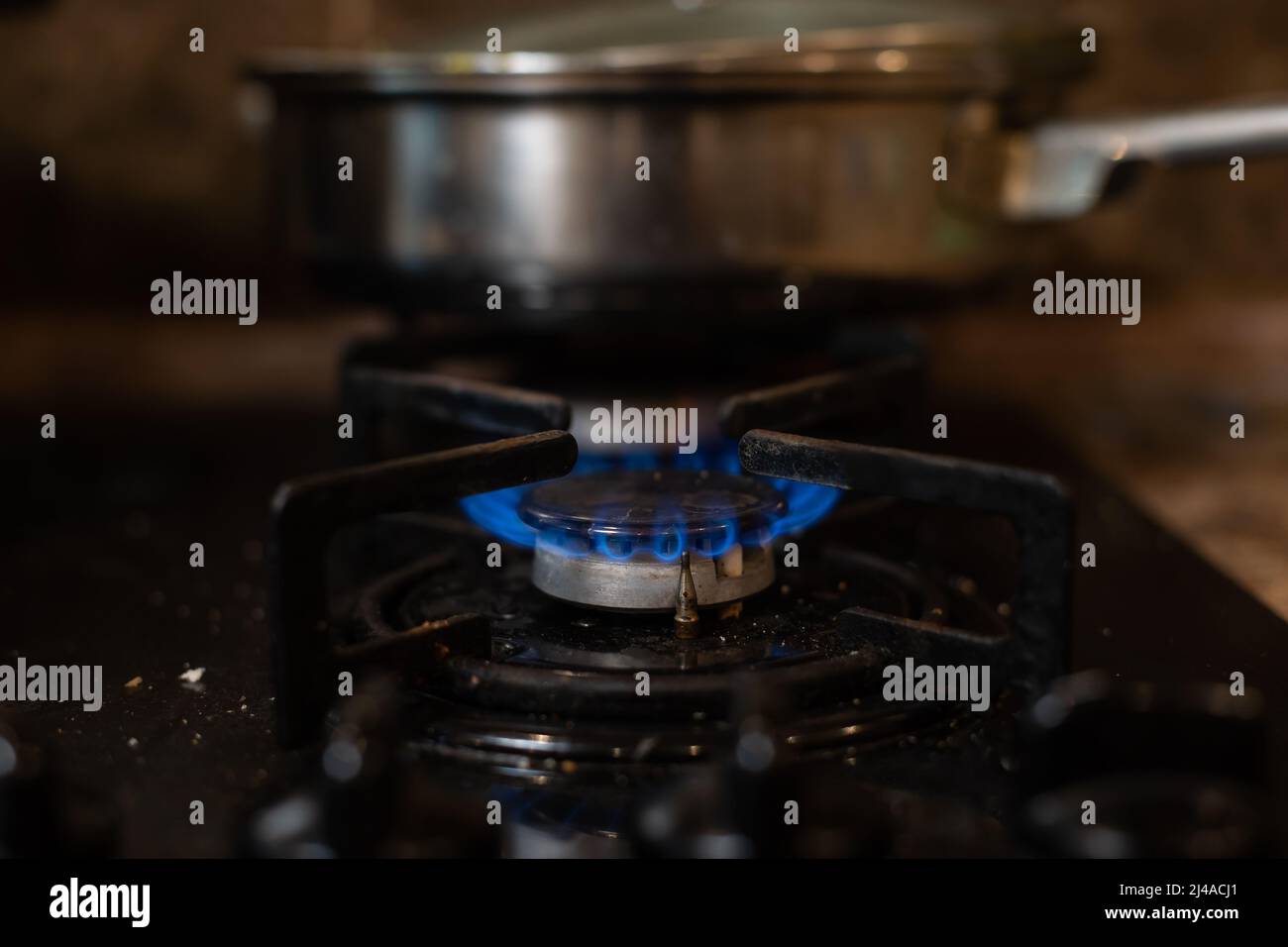 dirty gas stove in the kitchen Stock Photo - Alamy