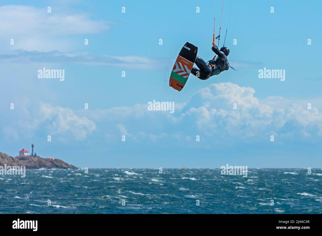 Wind Kiter riding the waves and wind in Juan de Fuca Strait-Victoria ...