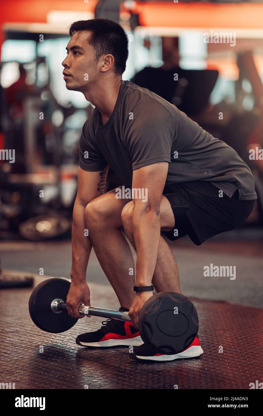 This is the heaviest weight Ive used. Shot of a young man about to lift ...