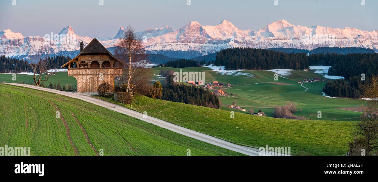 Emmental farmhouse with a view of the Bernese Alps Stock Photo - Alamy