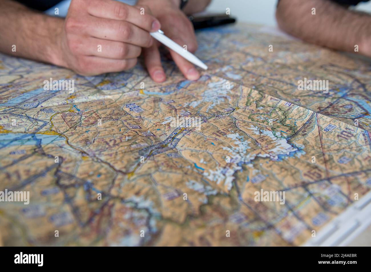 flight planing with a map Stock Photo - Alamy