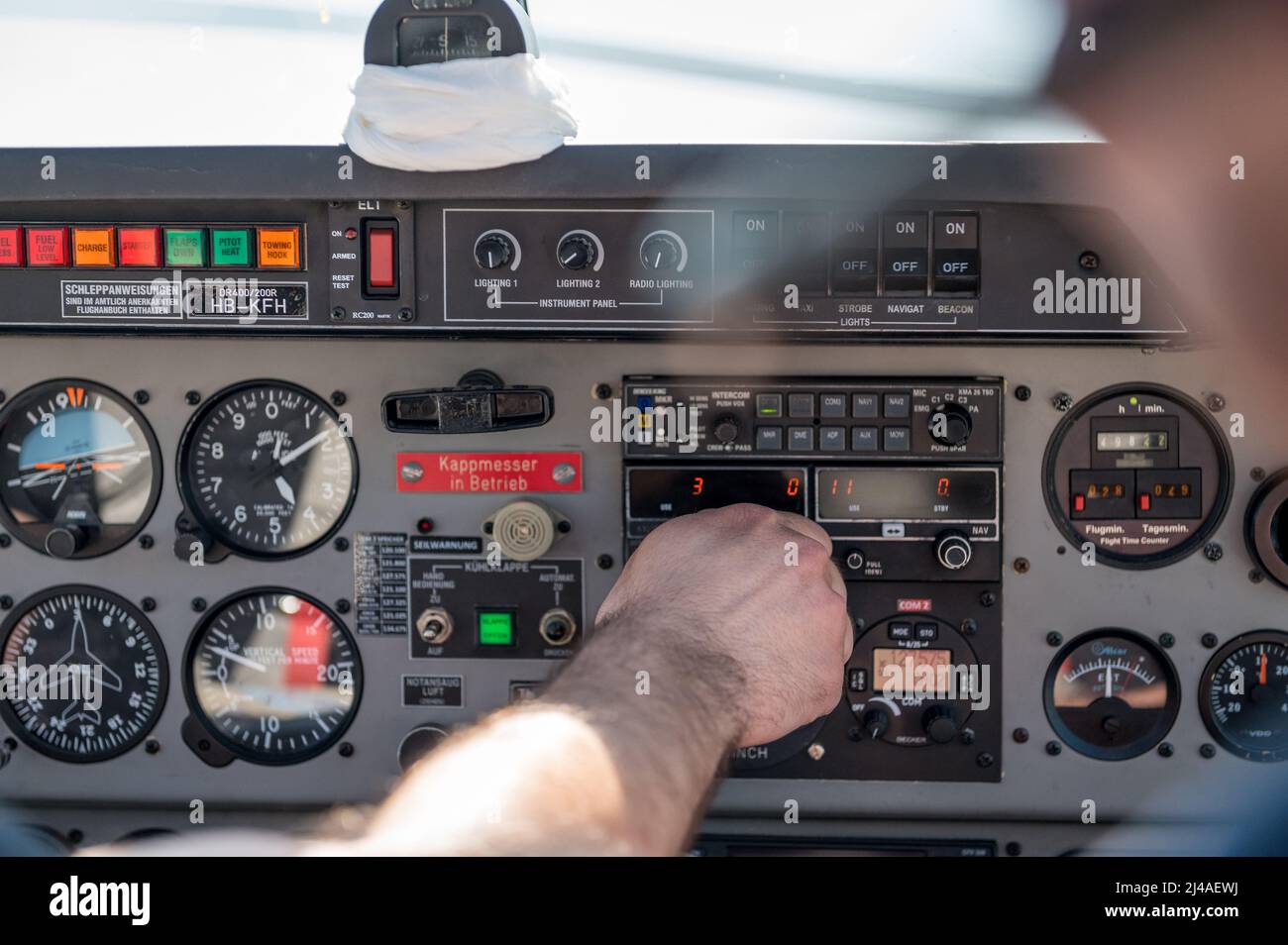 cockpit with pilots hand Stock Photo - Alamy