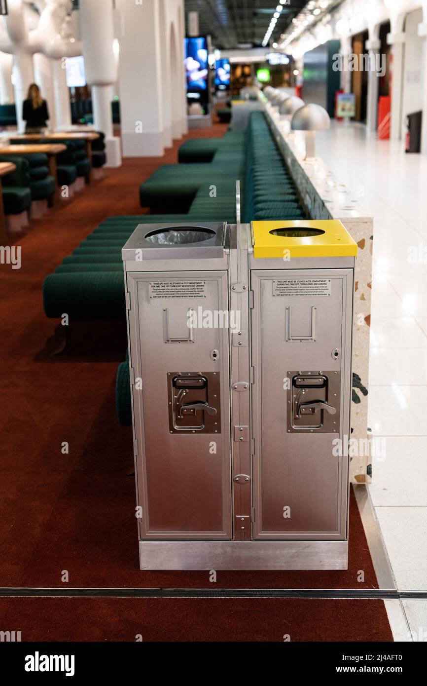 This photograph shows trash bins made with recycled fly containers ...