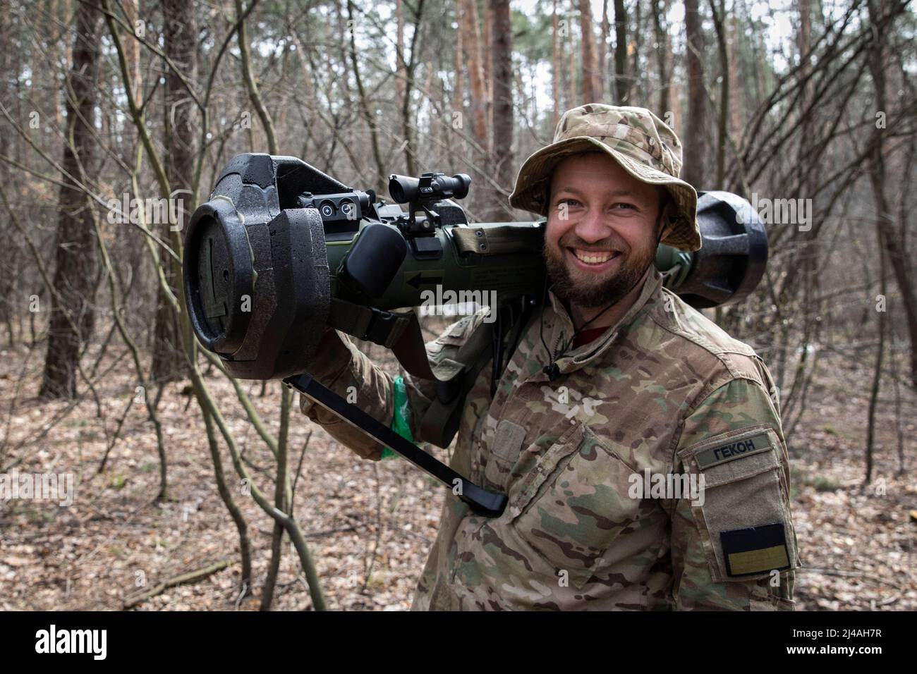 Ukraine. 12th Apr, 2022. Oleg (31) poses for a photo as he holds the ...