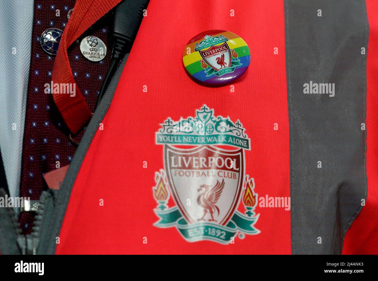 A steward wears a Liverpool badge during the UEFA Champions League ...