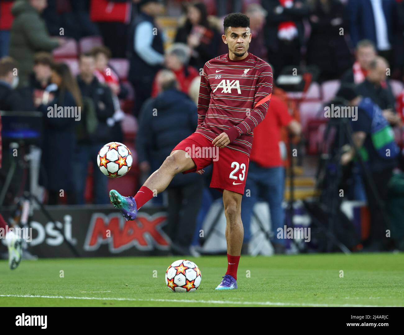 Liverpool, England, 13th April 2022. Luis Diaz of Liverpool warms up ...