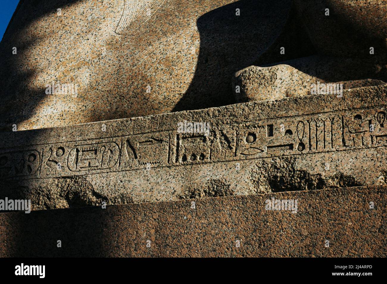Egyptian hieroglyphs sphinx ancient hard sun light beam Stock Photo - Alamy