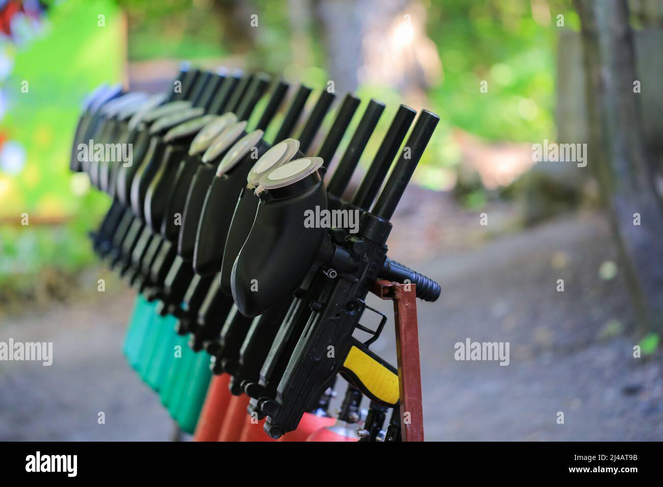 Paintball weapon on the stand Stock Photo - Alamy