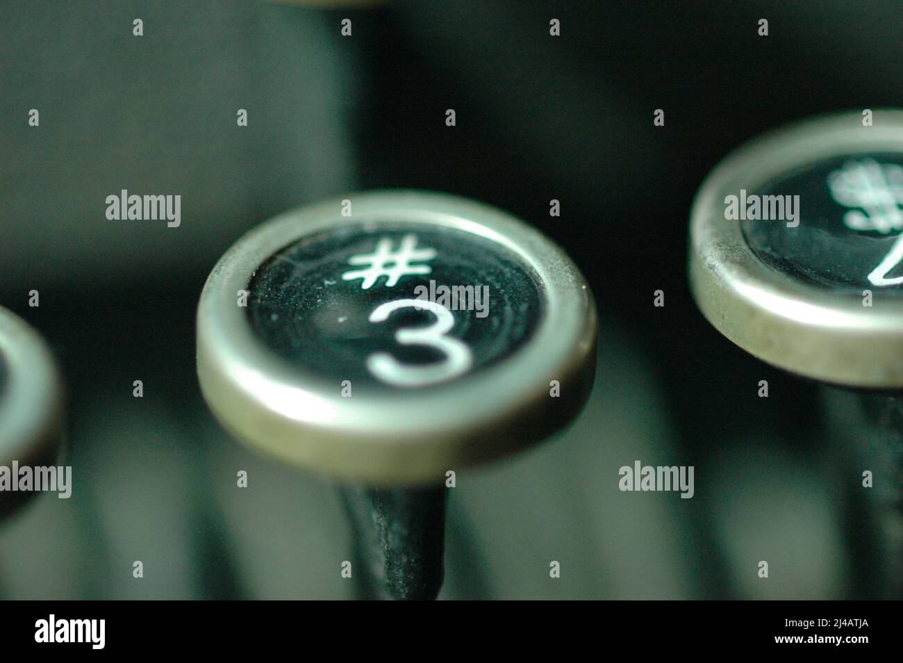 An Old manual typewriter with its working keyes with numbers and ...