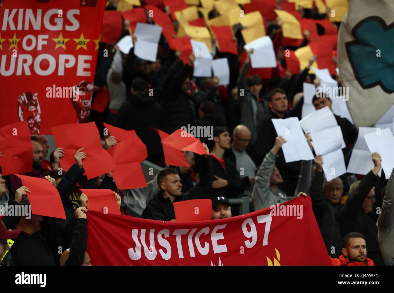 Liverpool, England, 13th April 2022. Liverpool fans hold aloft cards to ...