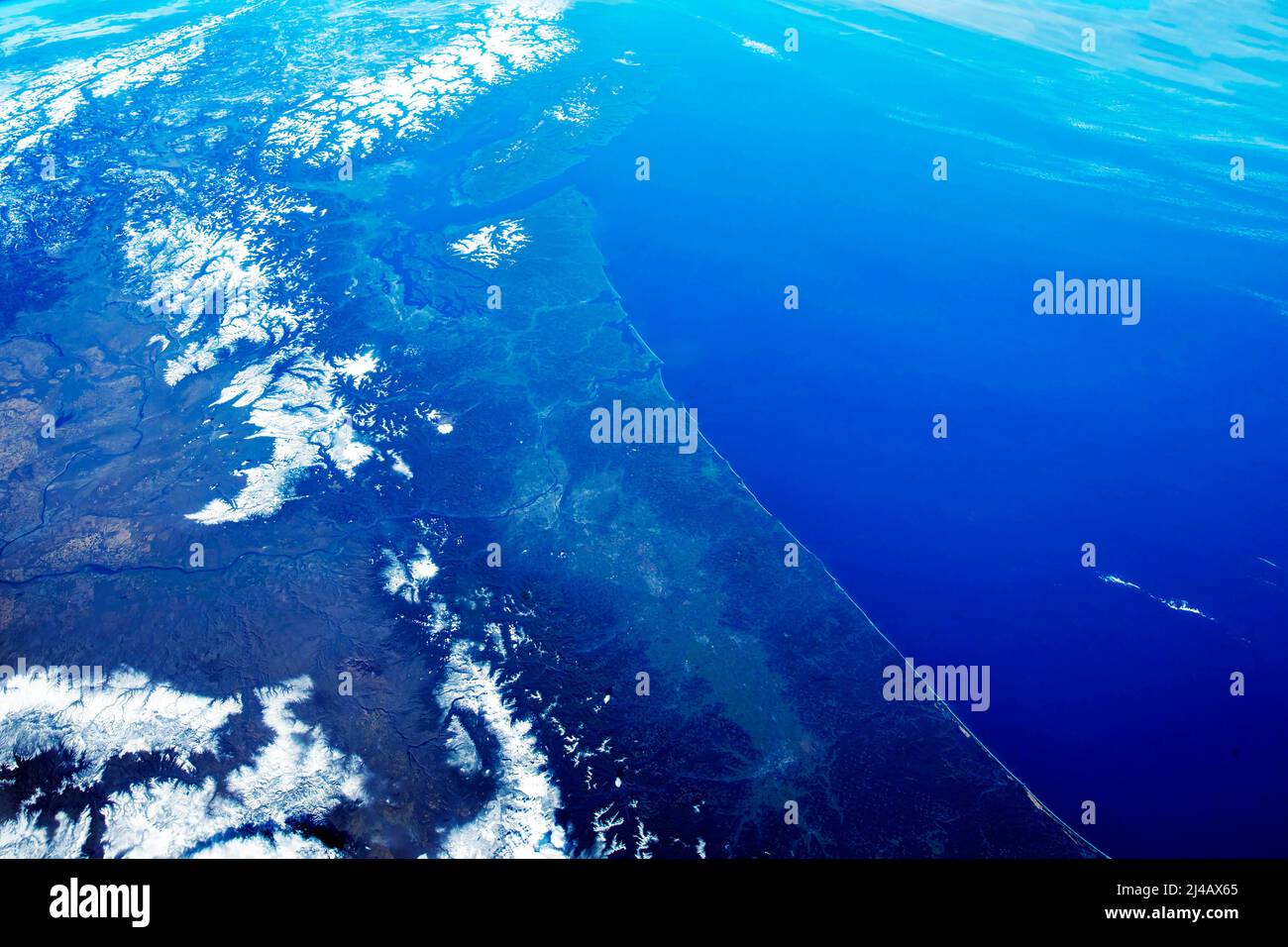 Coast from space. Elements of this image furnished by NASA. High ...
