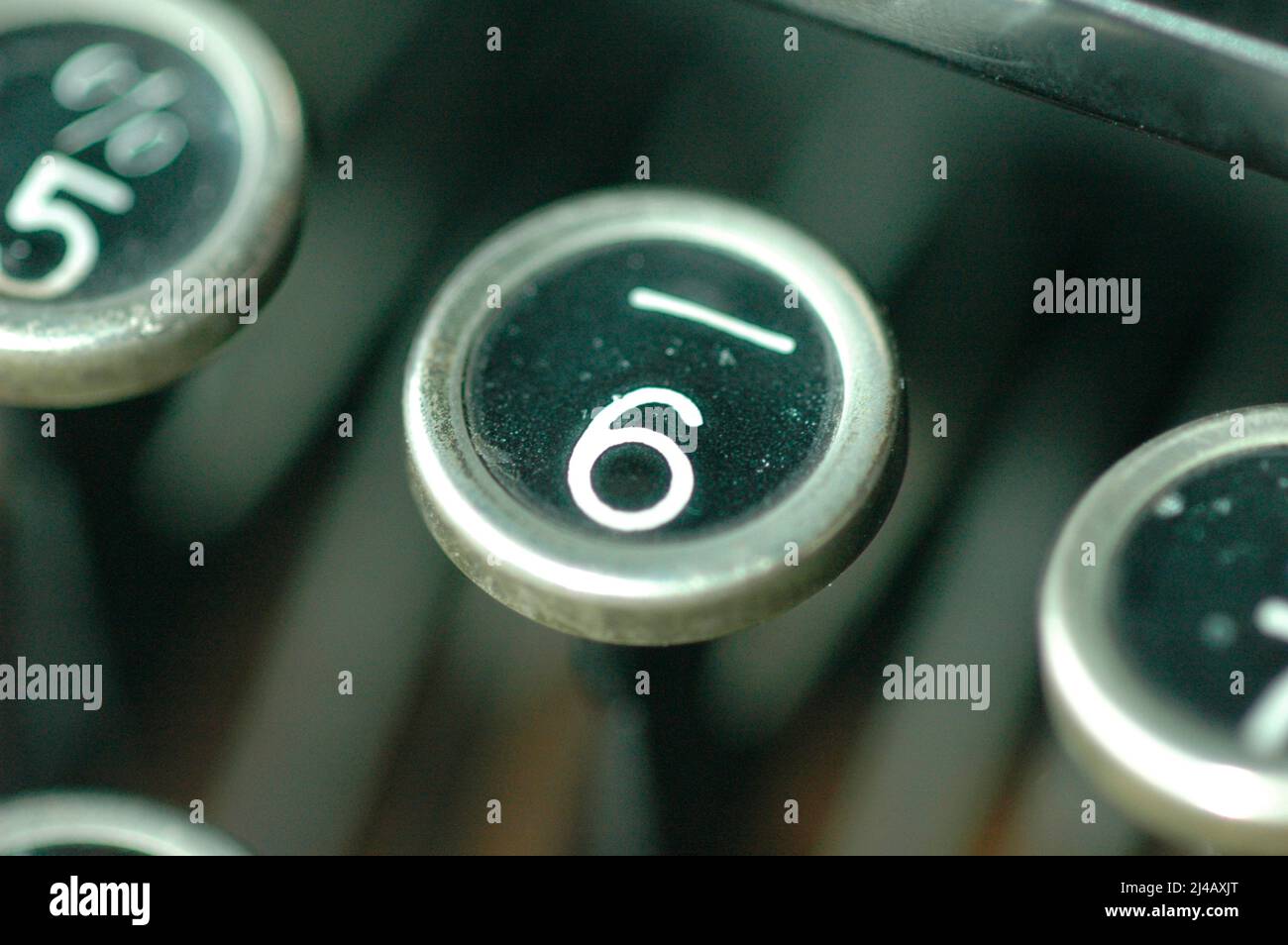 An Old manual typewriter with its working keyes with numbers and ...