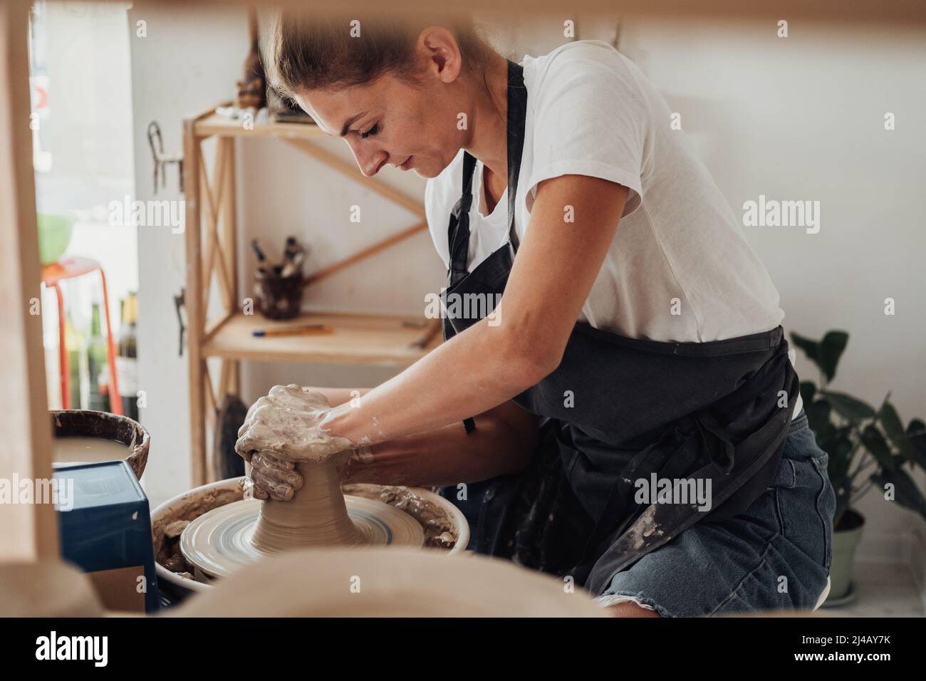 Potter Master at Work, Young Caucasian Woman Creating Clay Pot on a ...