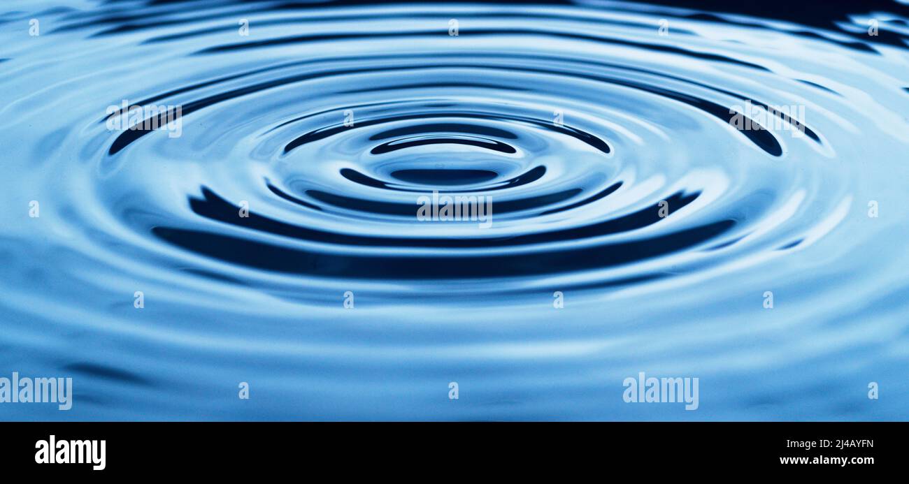 The ripple affect. Abstract studio shot of ripples in a puddle of water ...