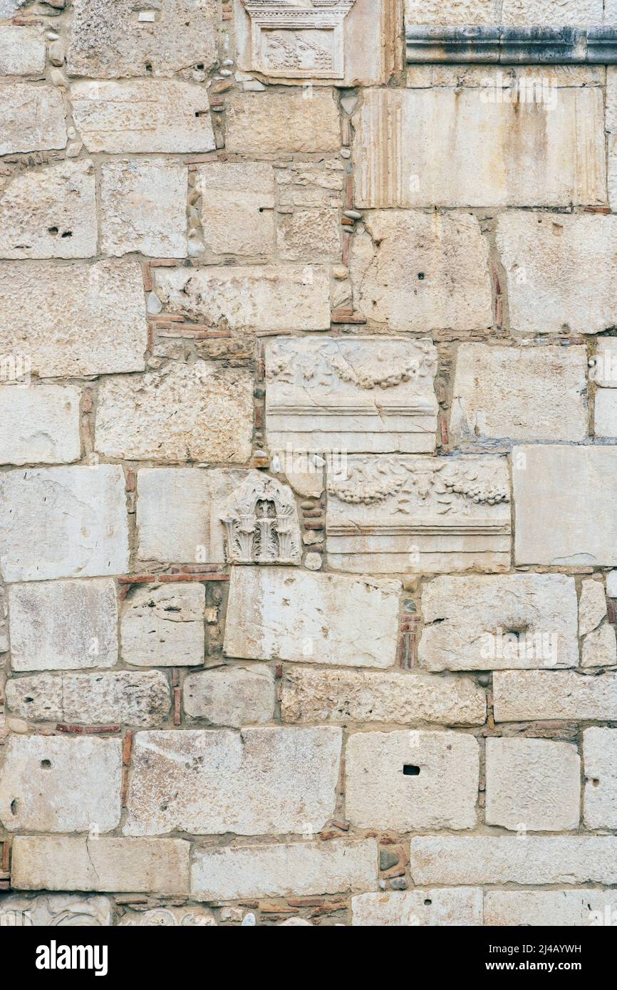 old wall of old Romanesque blocks as a background, Benevento, Campania ...