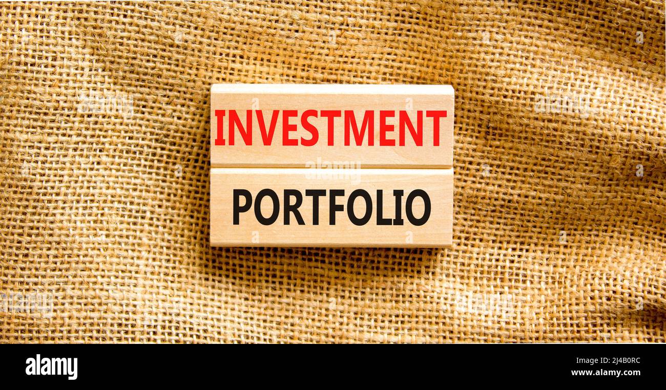 Investment portfolio symbol. Wooden blocks with concept words ...