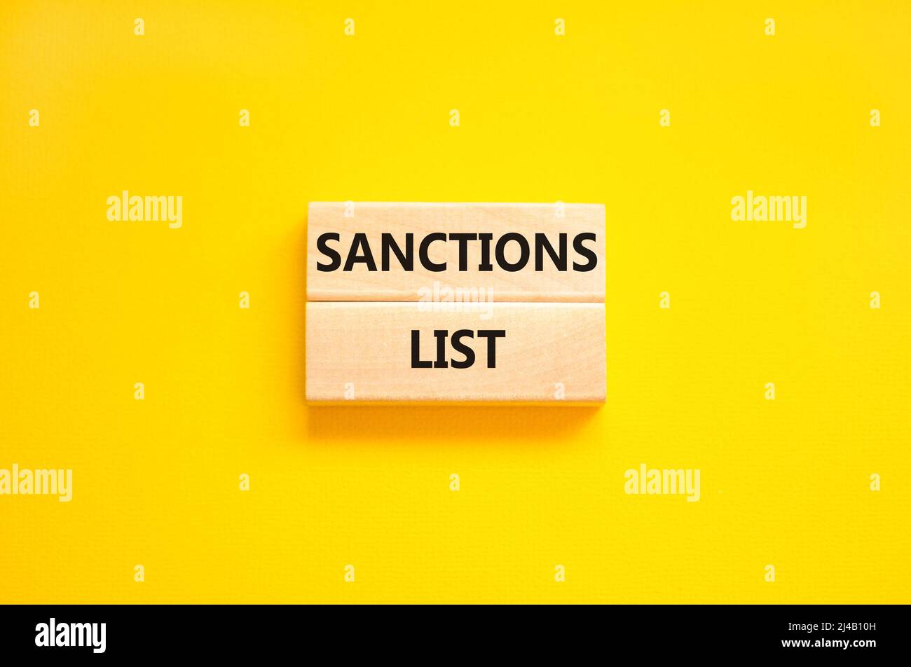 Sanctions list symbol. Wooden blocks with concept words Sanctions list ...