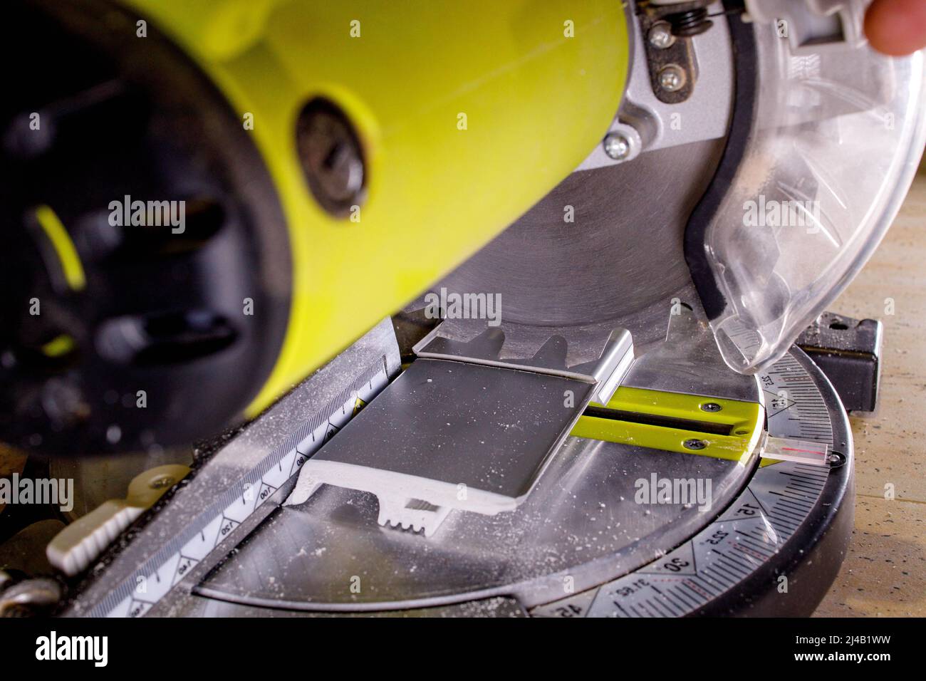 The circular saw cuts the plinth. Tool for repair work Stock Photo - Alamy
