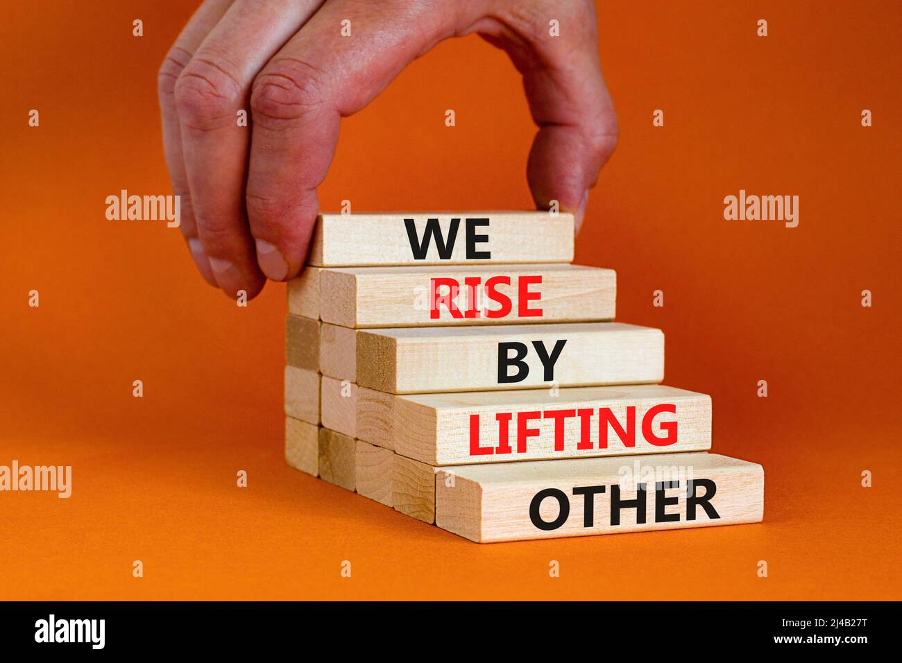 We rise by lifting other symbol. Concept words We rise by lifting other ...