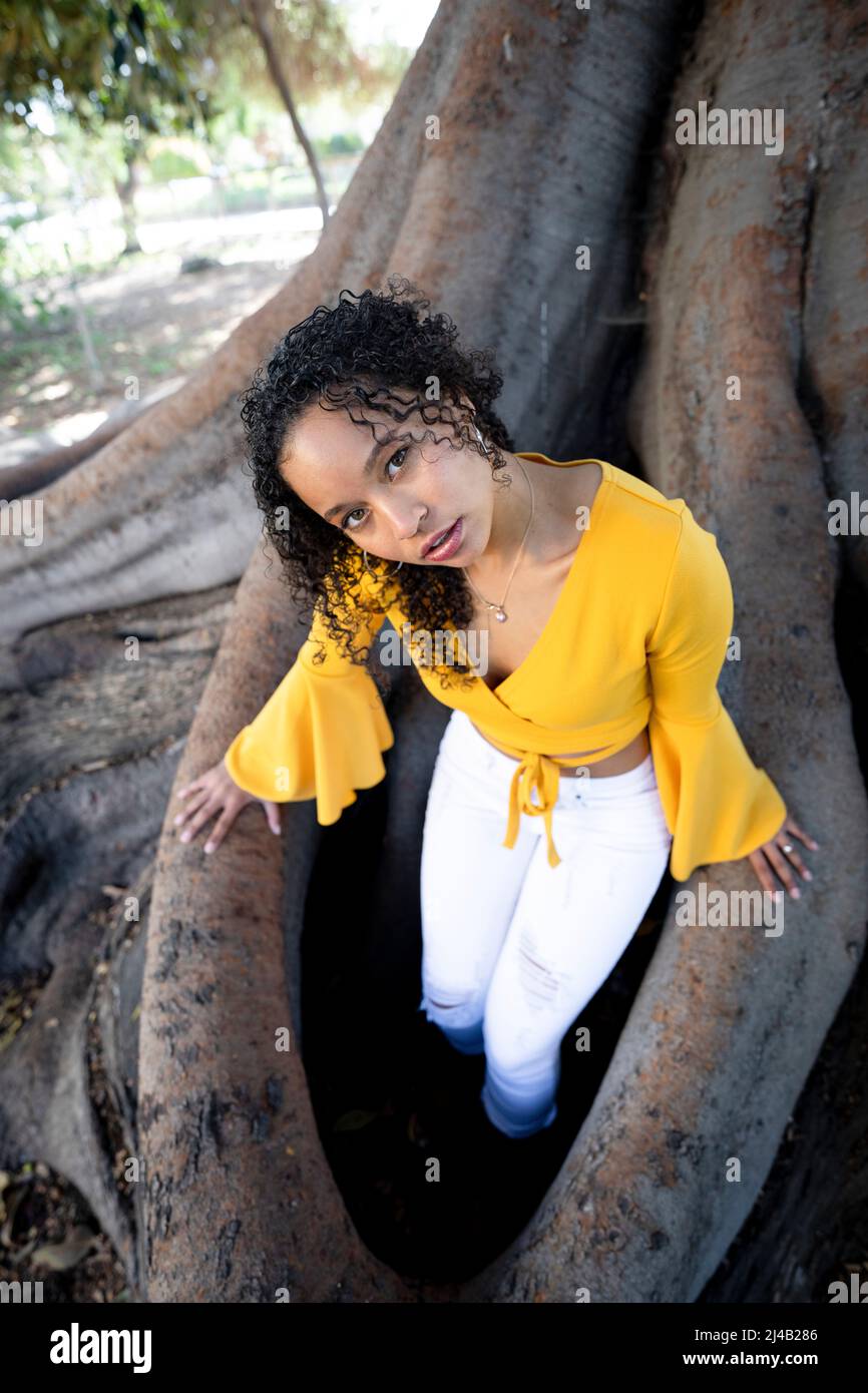 Portrait of a Beautiful Young Black Woman Surrounded By Enormous Rubber ...