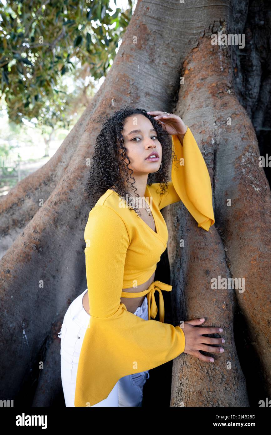 Portrait of a Beautiful Young Black Woman Surrounded By Enormous Rubber ...