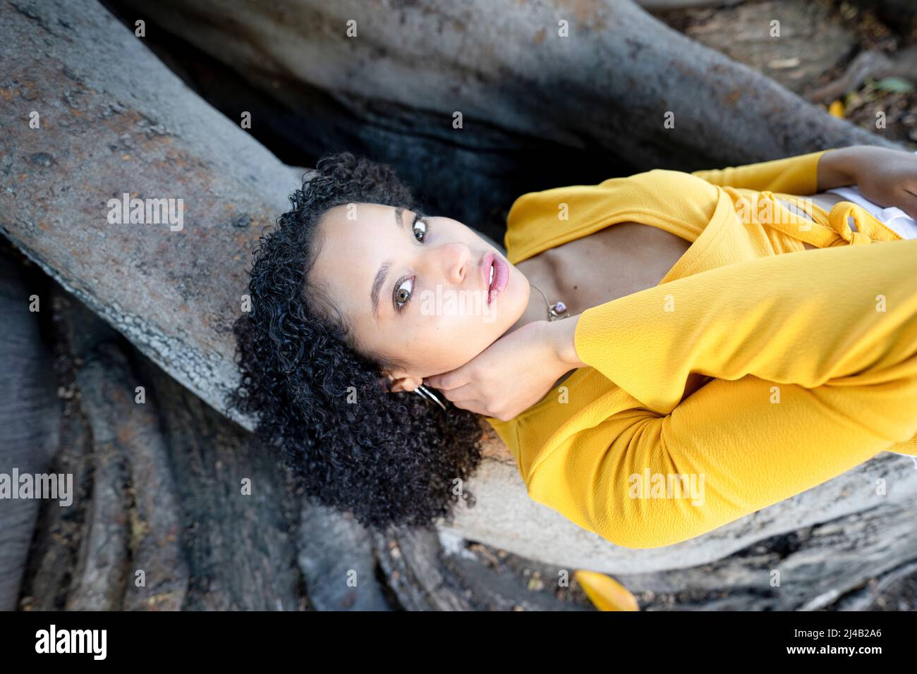 Portrait of a Beautiful Young Black Woman Surrounded By Enormous Rubber ...