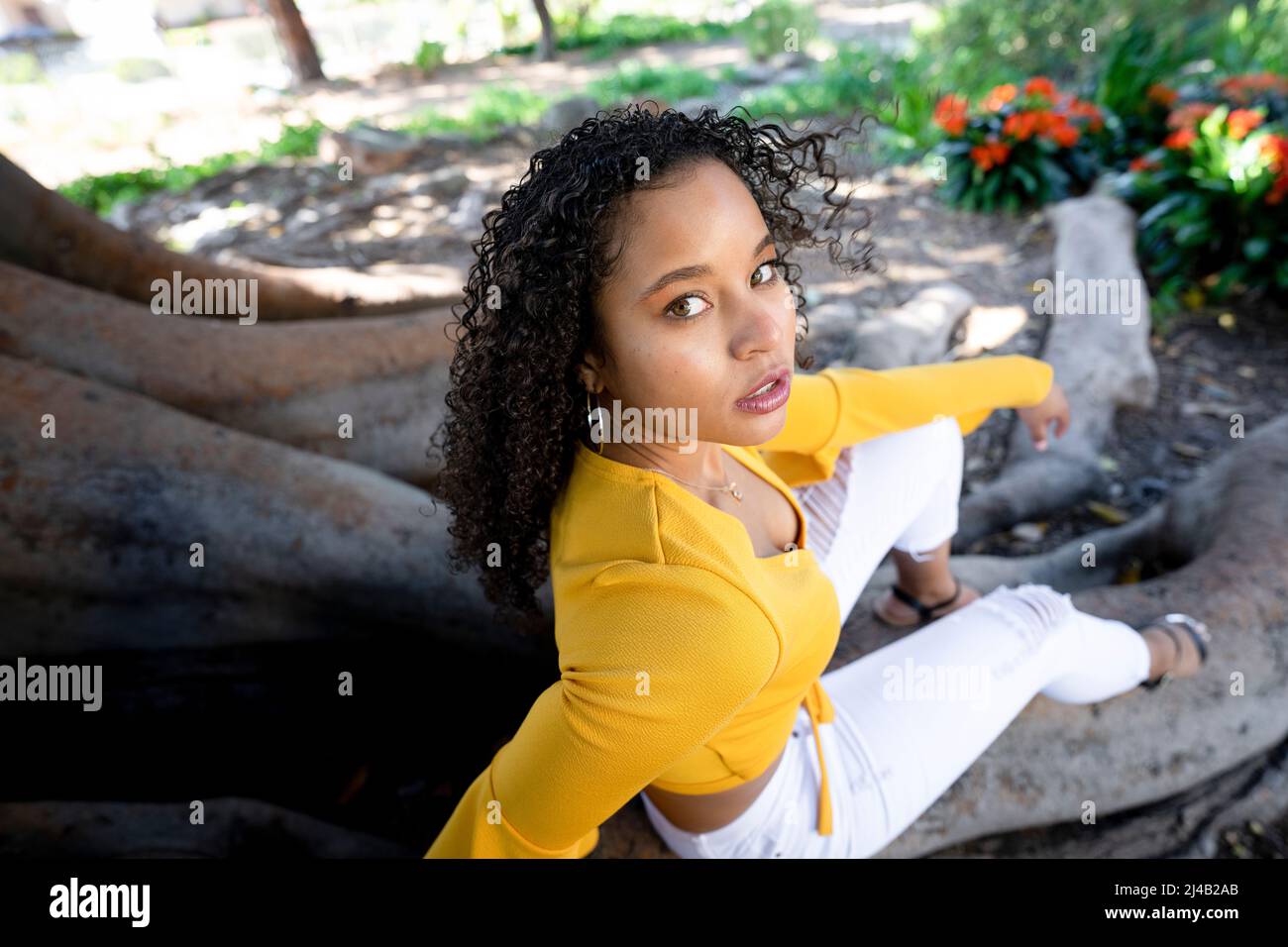 Portrait of a Beautiful Young Black Woman Surrounded By Enormous Rubber ...