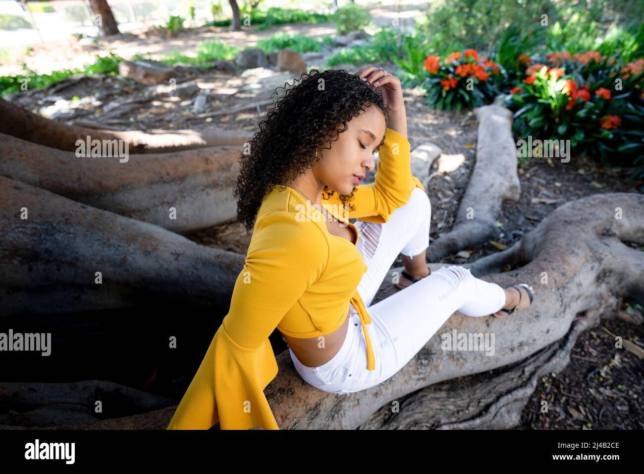 Portrait of a Beautiful Young Black Woman Surrounded By Enormous Rubber ...