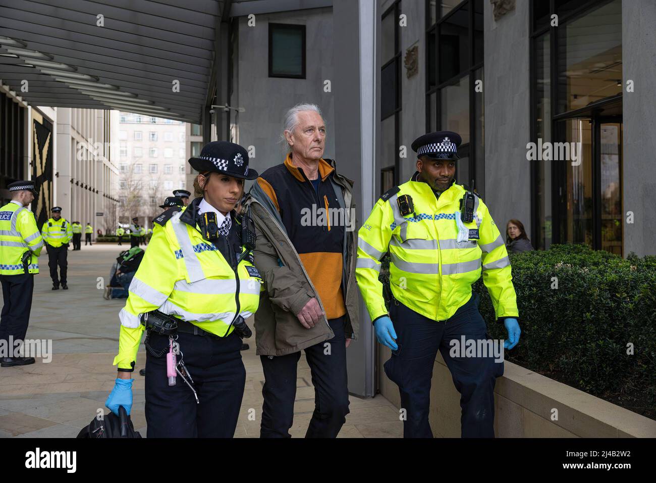London, UK. 13th Apr, 2022. A protester is being arrested by police ...
