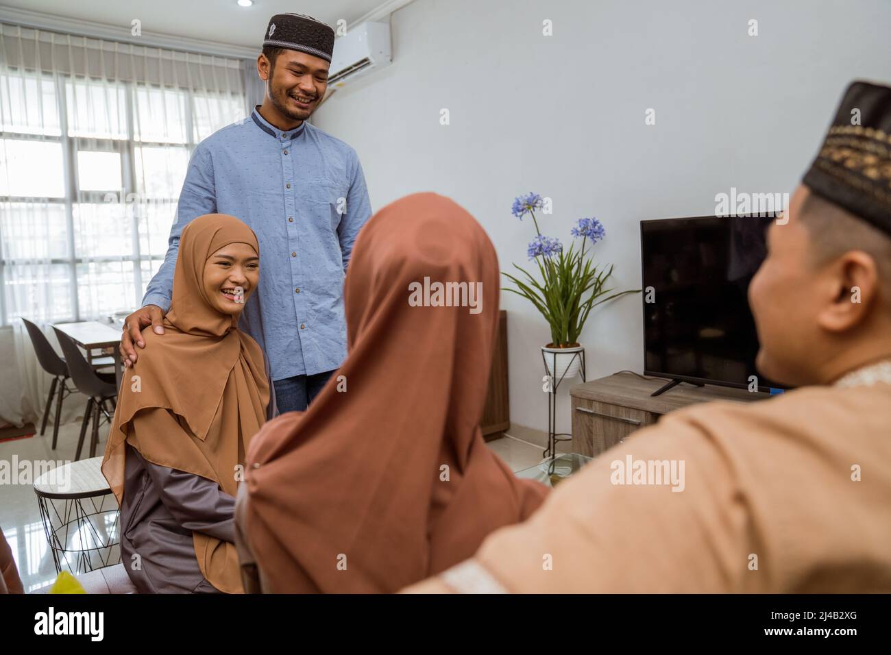 visiting friend and family during eid mubarak islamic day Stock Photo ...