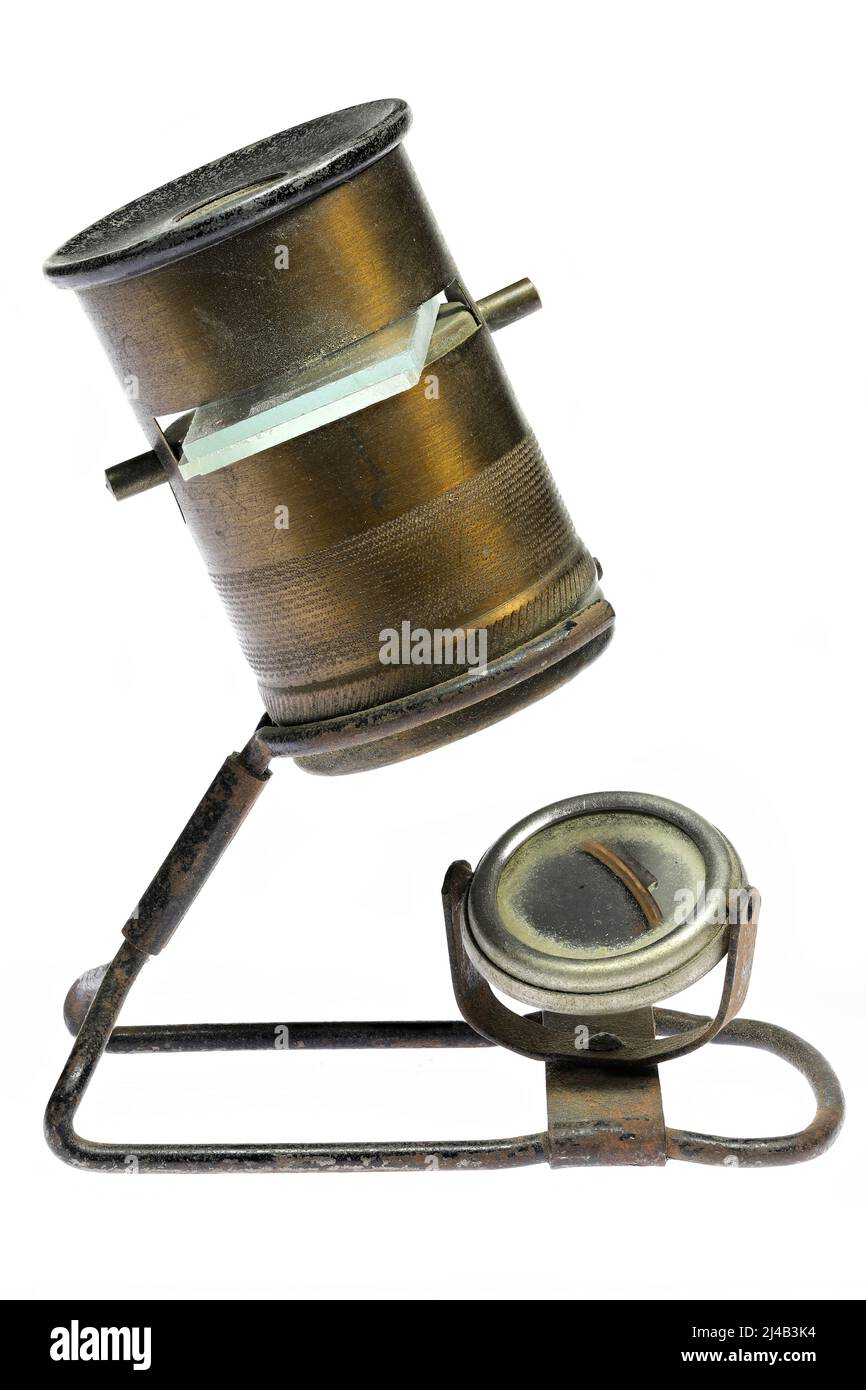 vintage pocket microscope isolated on white background Stock Photo - Alamy