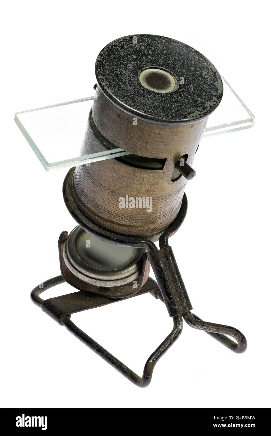 vintage pocket microscope isolated on white background Stock Photo - Alamy