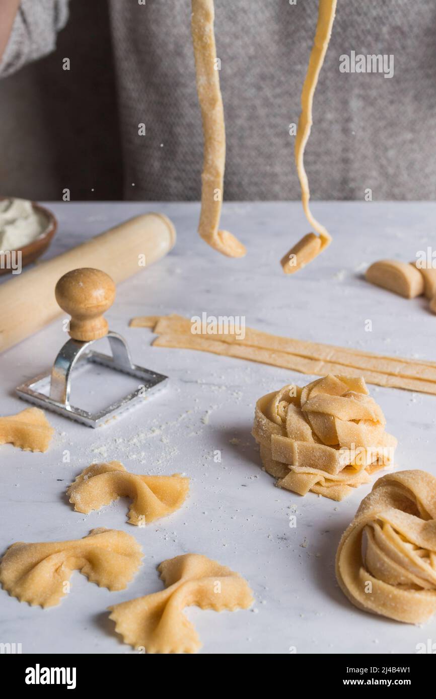 DIfferent types of homemade fresh pasta Stock Photo - Alamy
