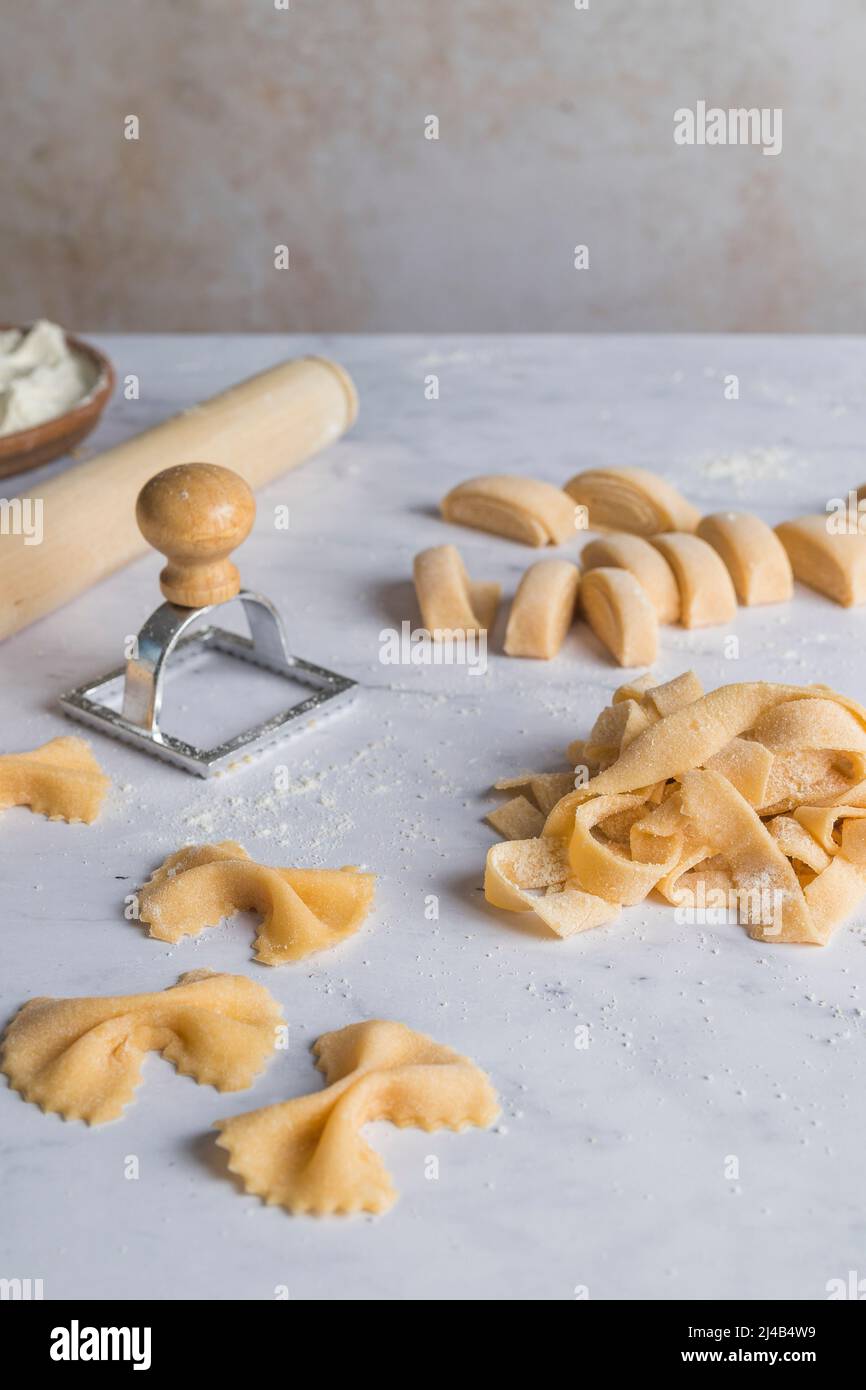 DIfferent types of homemade fresh pasta Stock Photo - Alamy