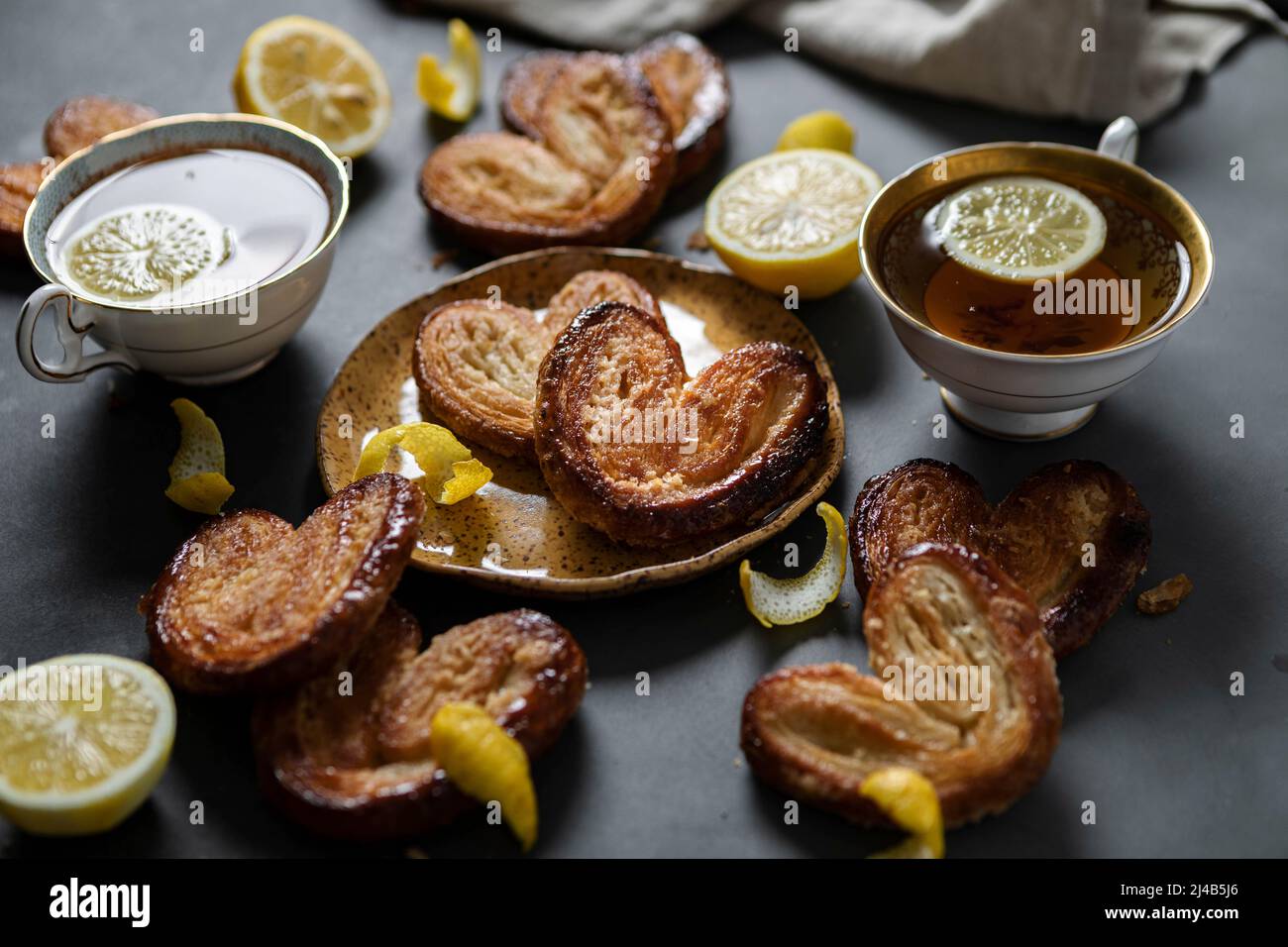 Lemon Palmiers, made from puff pastry on a dark background Stock Photo ...