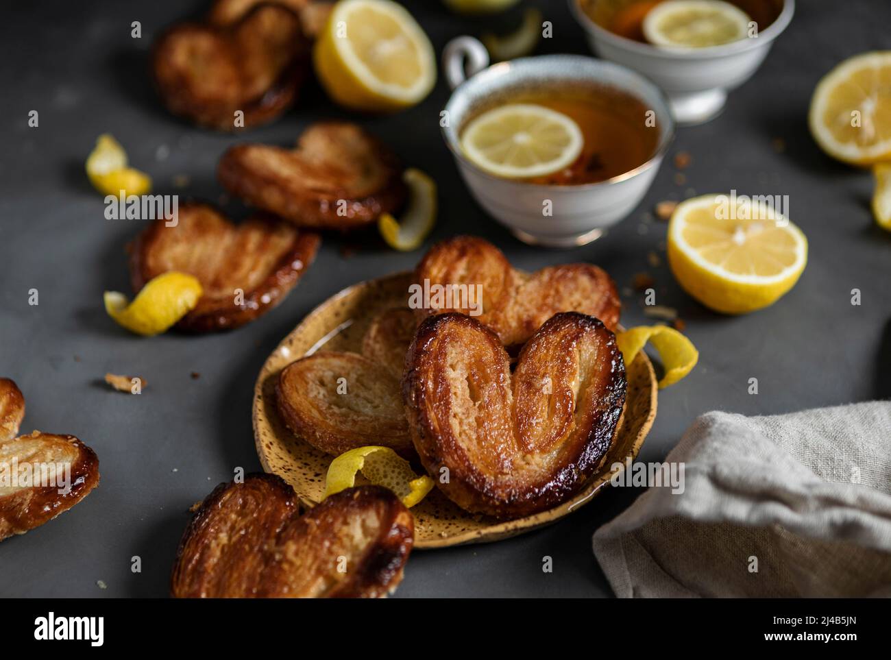 Lemon Palmiers, made from puff pastry on a dark background Stock Photo ...
