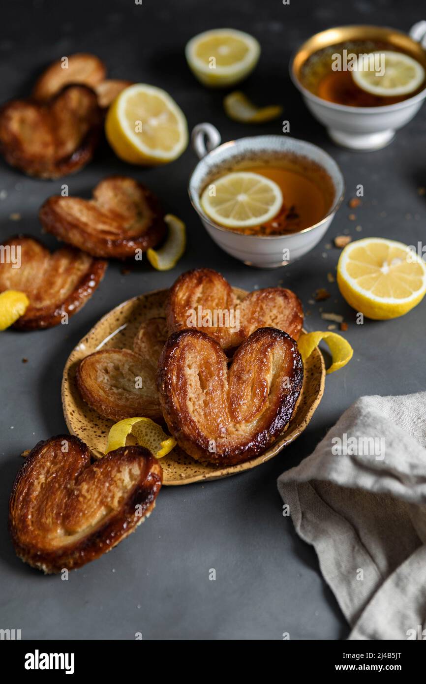 Lemon Palmiers, made from puff pastry on a dark background Stock Photo ...