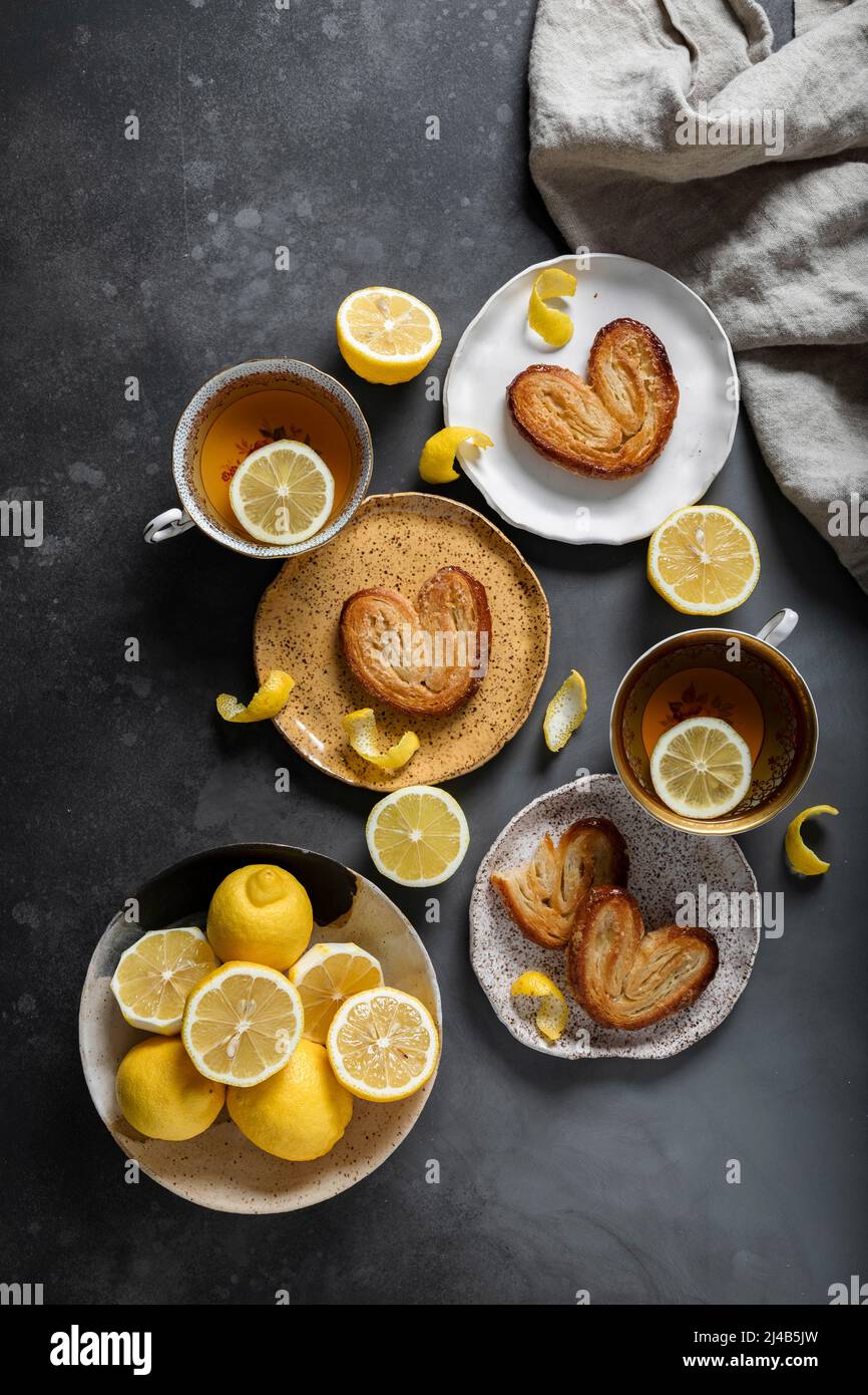 Lemon Palmiers, made from puff pastry on a dark background Stock Photo ...
