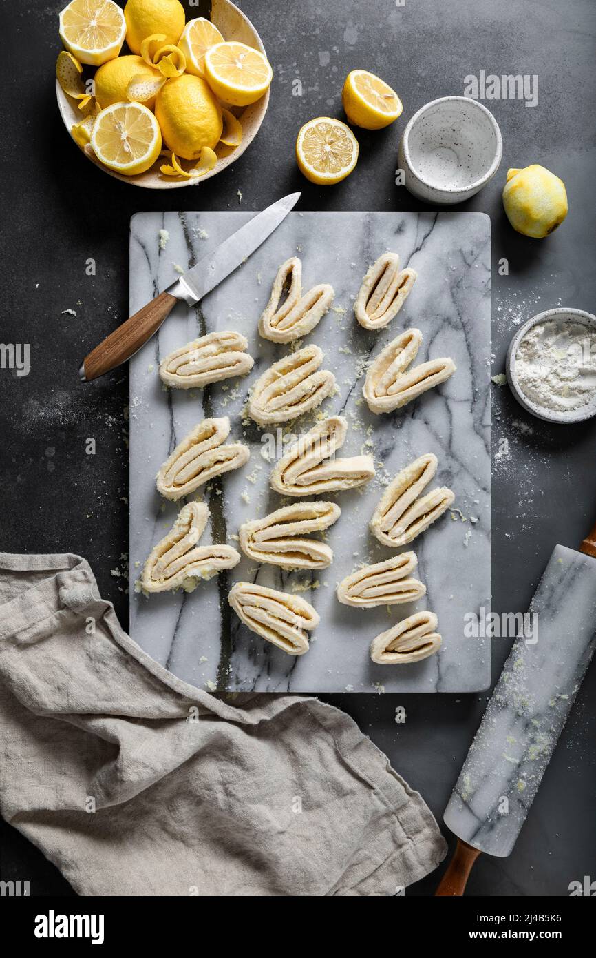 Lemon Palmiers, made from puff pastry on a dark background Stock Photo ...